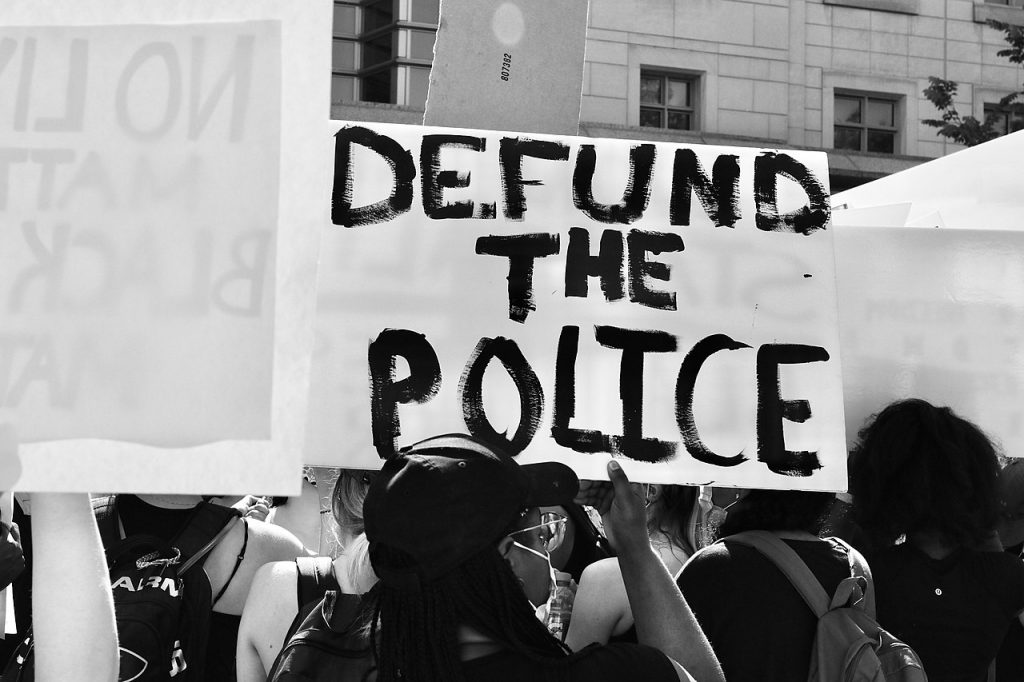 The Real Meaning Behind The Phrase "Defund the Police"